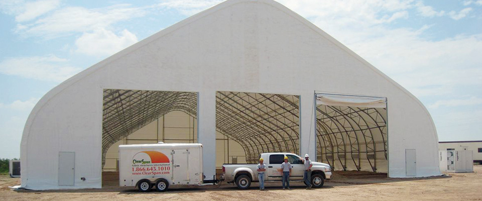 Construction Vehicle Garage – Fabric, Metal or Hybrid