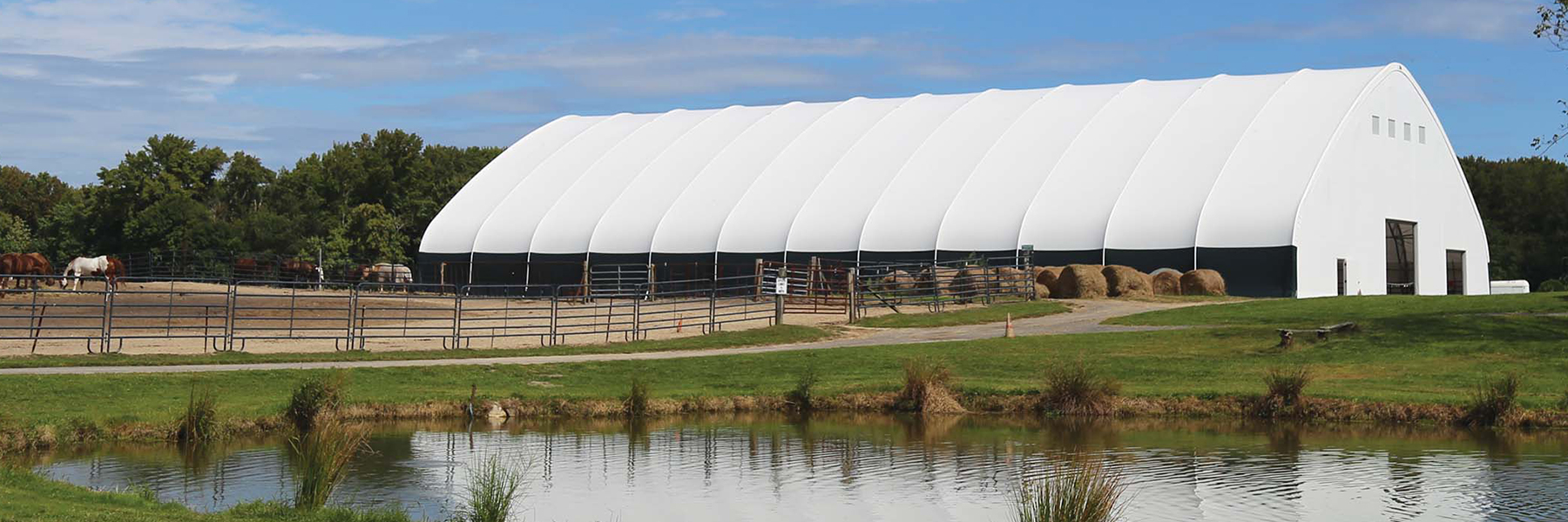 Farm Buildings - Arch Truss Fabric, Metal & Hybrid | ClearSpan