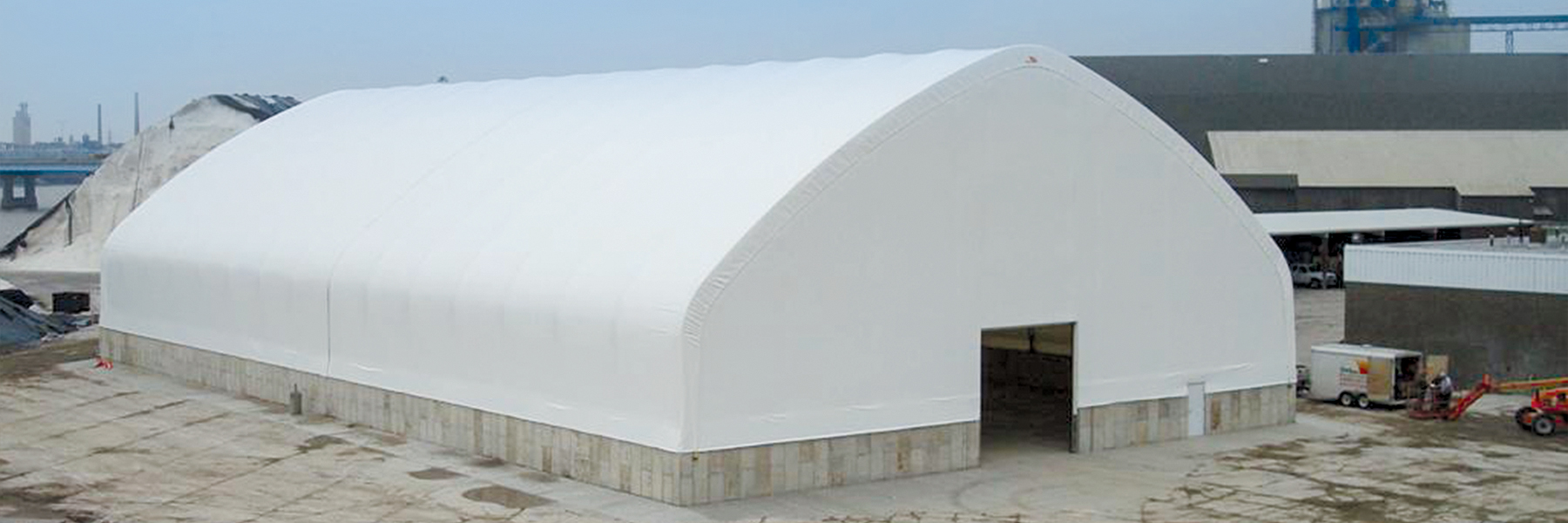 Construction Vehicle Garage – Fabric, Metal or Hybrid